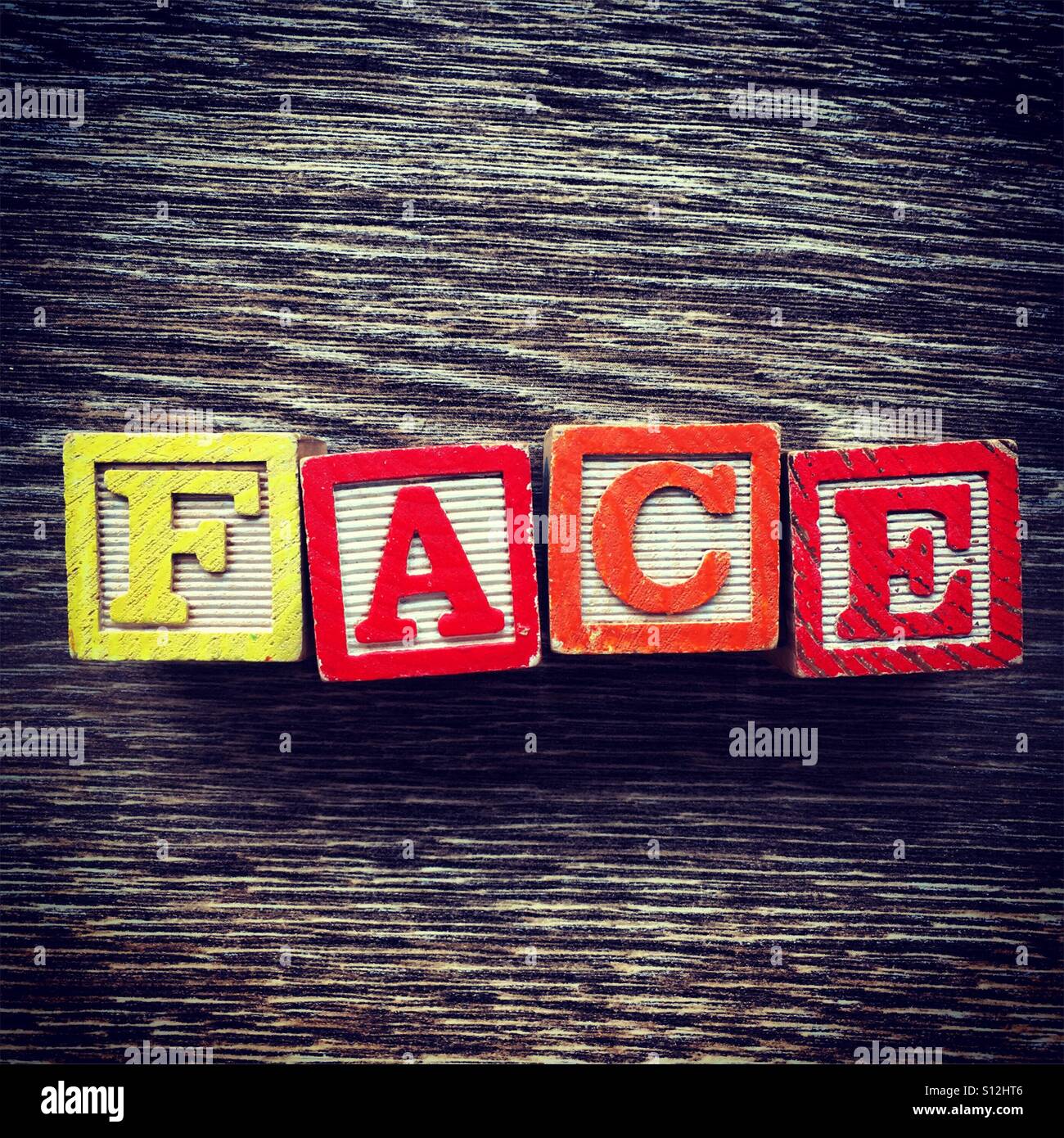 FACE word written with wood block letter toys Stock Photo - Alamy