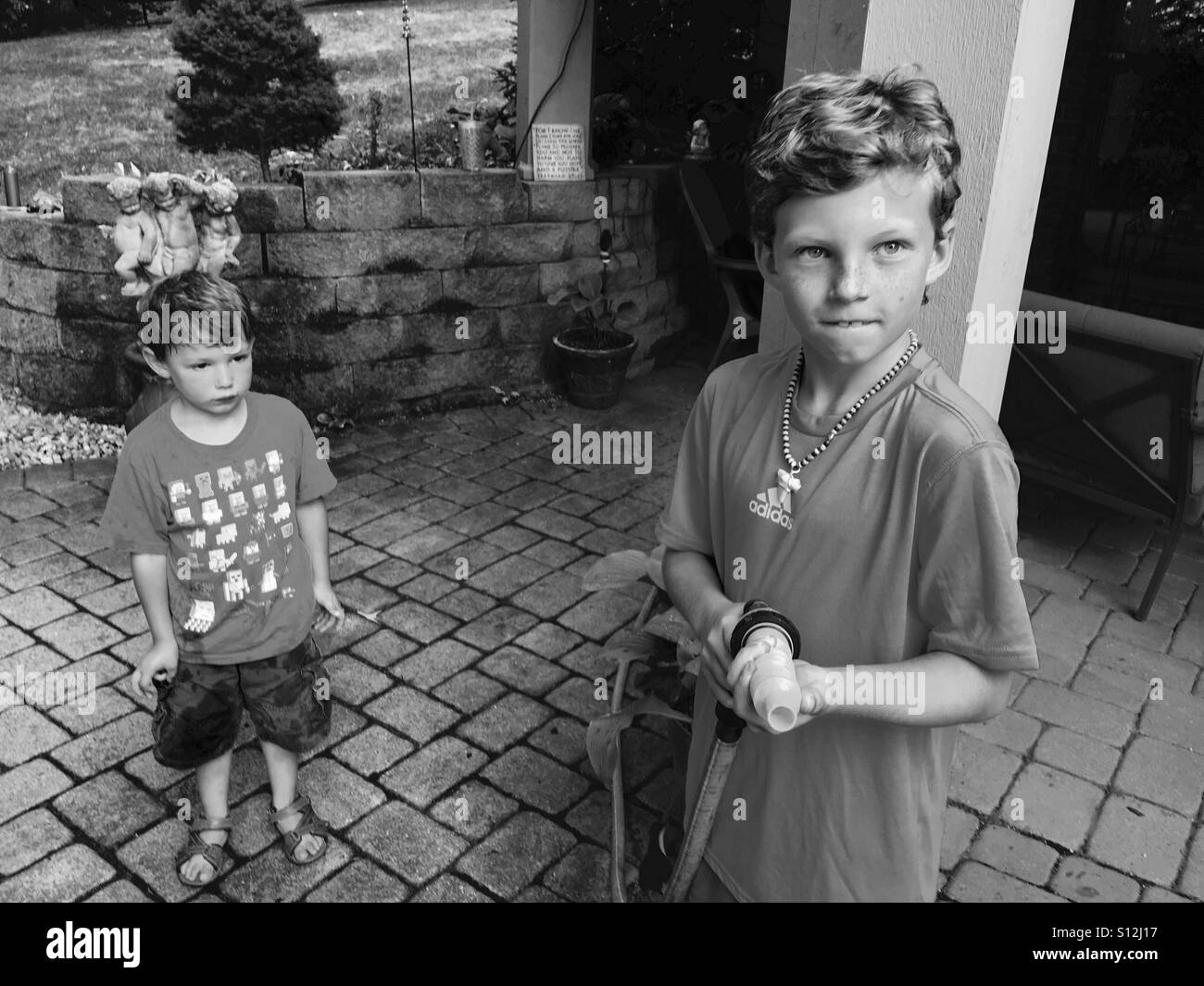 Brothers outside hi-res stock photography and images - Alamy