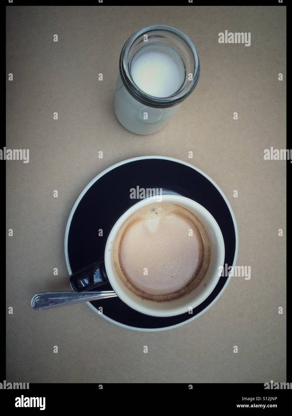 Americano with hot milk Stock Photo - Alamy