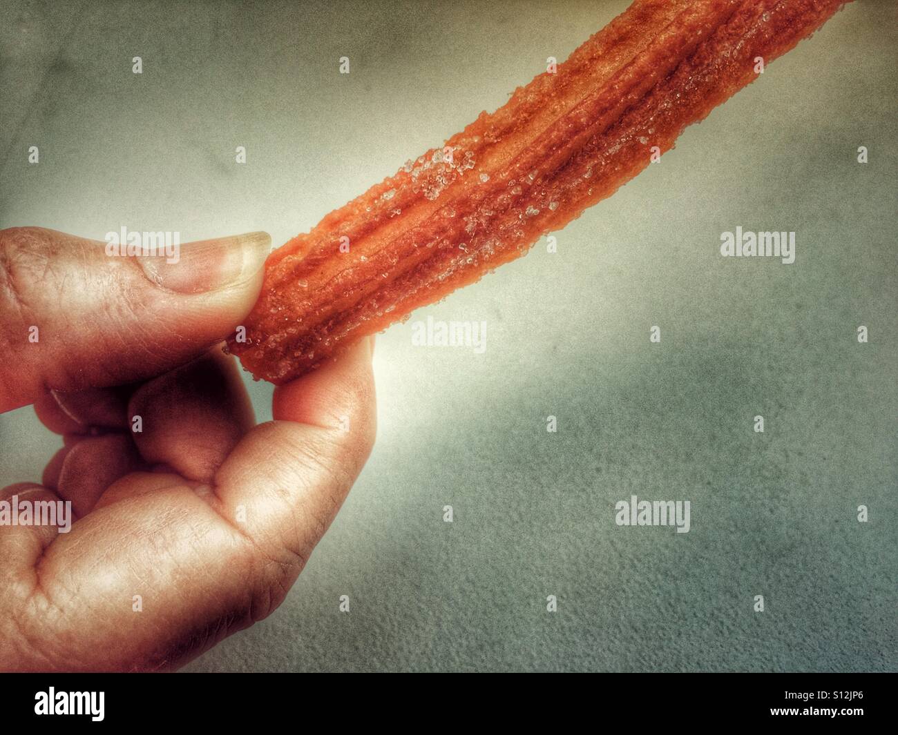 Churros spain holding hi-res stock photography and images - Alamy