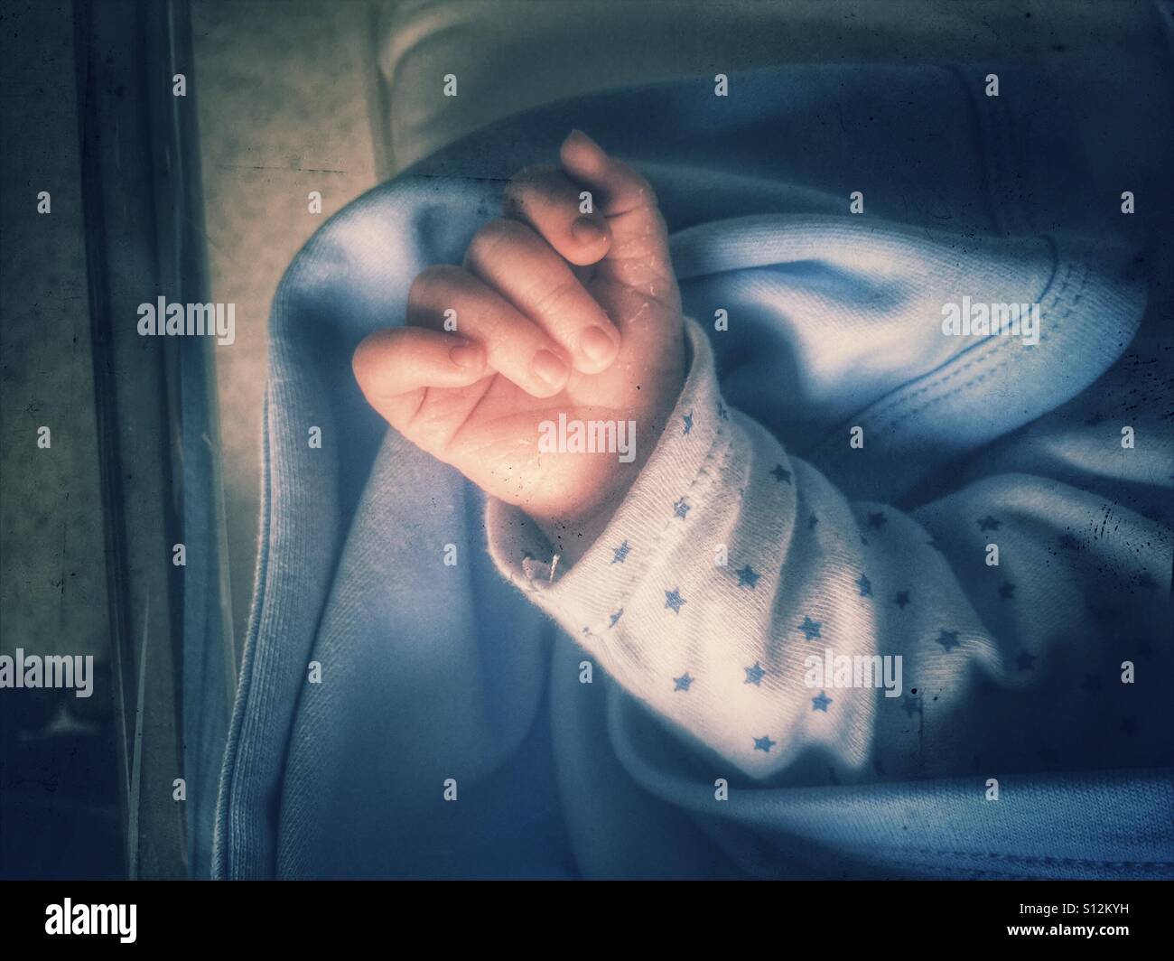 Baby boy hand Stock Photo - Alamy