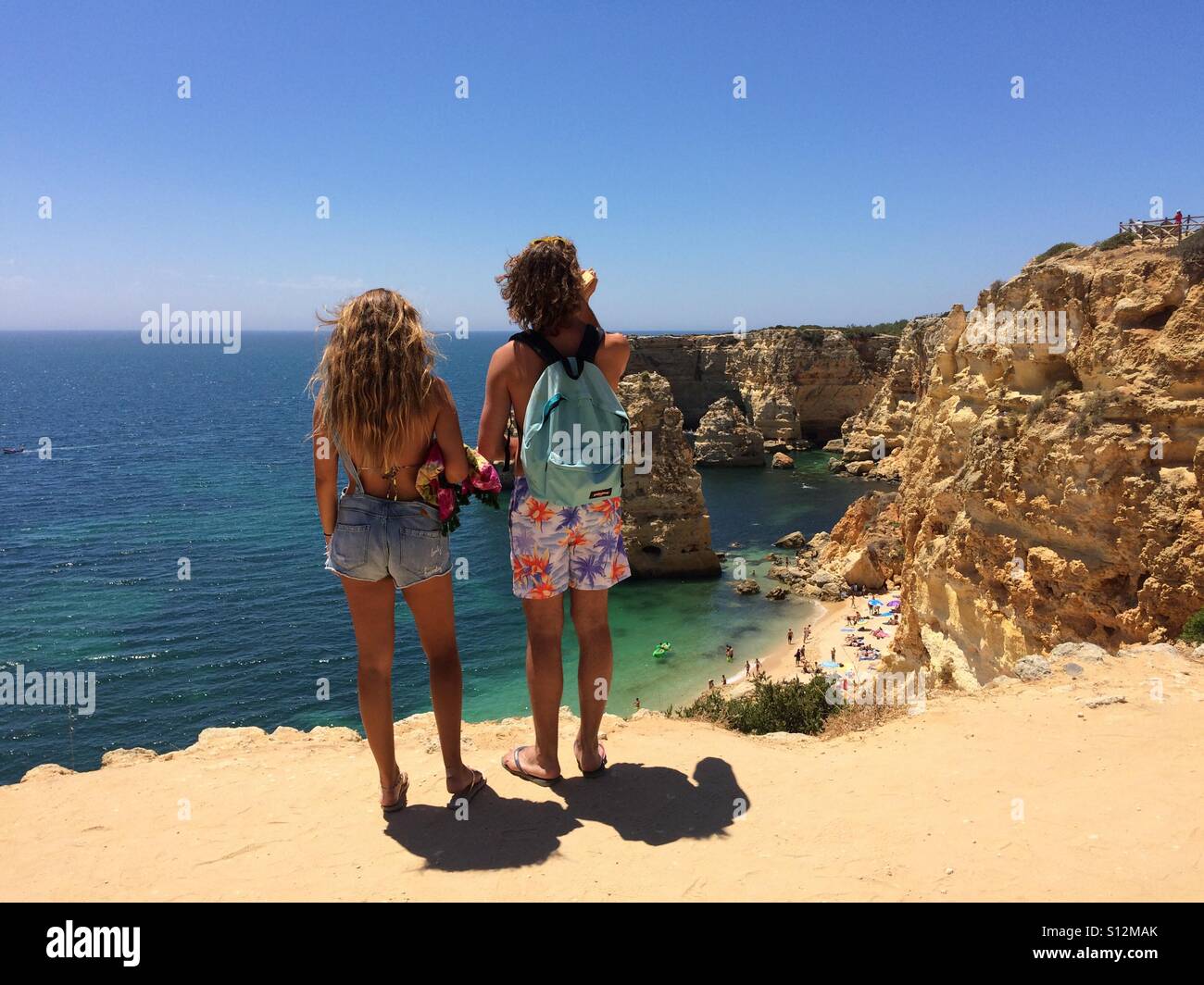 Looking at the beach in the Algarve Stock Photo - Alamy
