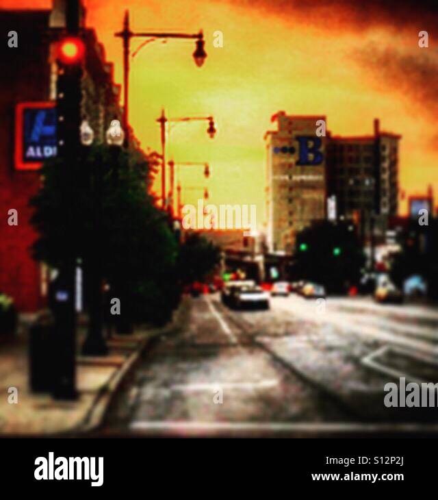 City street at sunset Stock Photo - Alamy