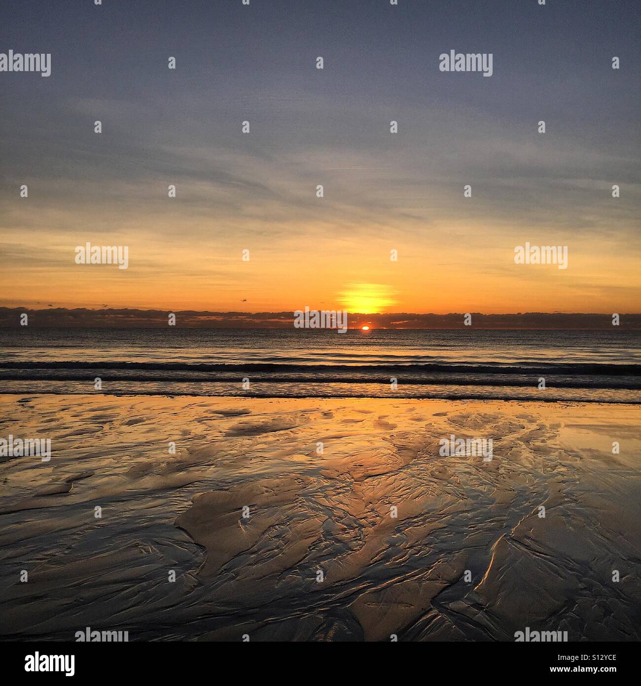 Sunrise on tropical beach, Australia Stock Photo - Alamy