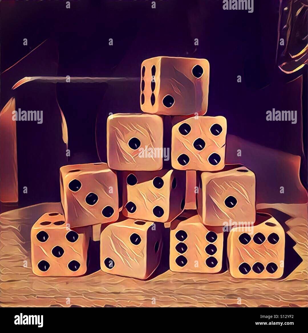 A bunch of dice stacked in a pyramid Stock Photo - Alamy