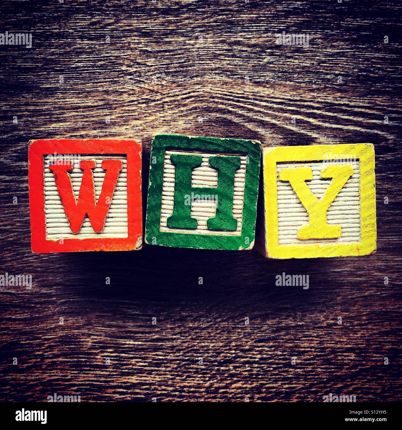 WHY word written with wood block letter toys Stock Photo - Alamy