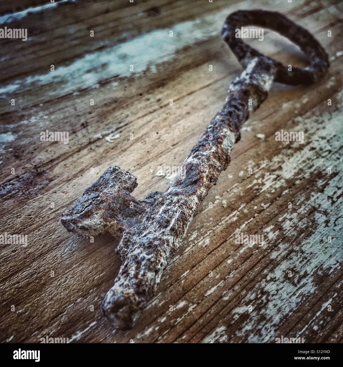 Rusty old key Stock Photo - Alamy