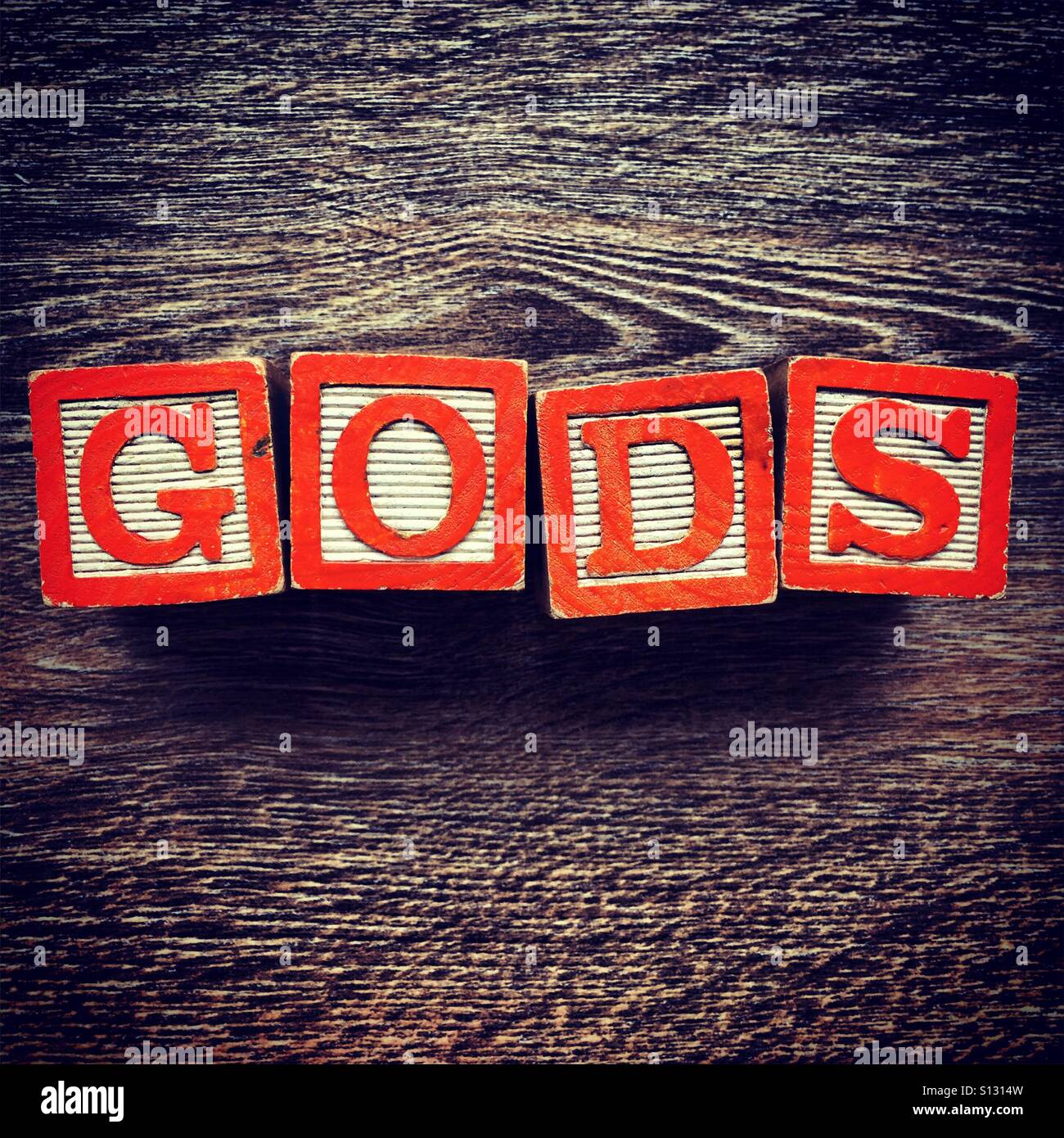 GODS word written with wood block letter toys Stock Photo - Alamy