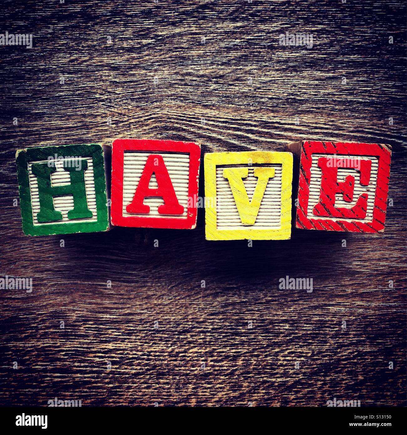 HAVE word written with wood block letter toys Stock Photo - Alamy