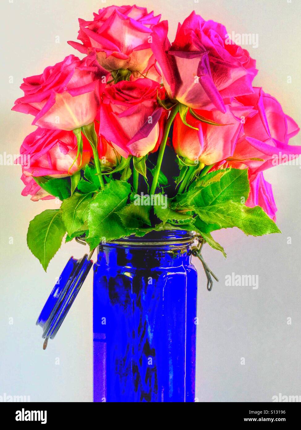 Roses in Mason jar Stock Photo - Alamy