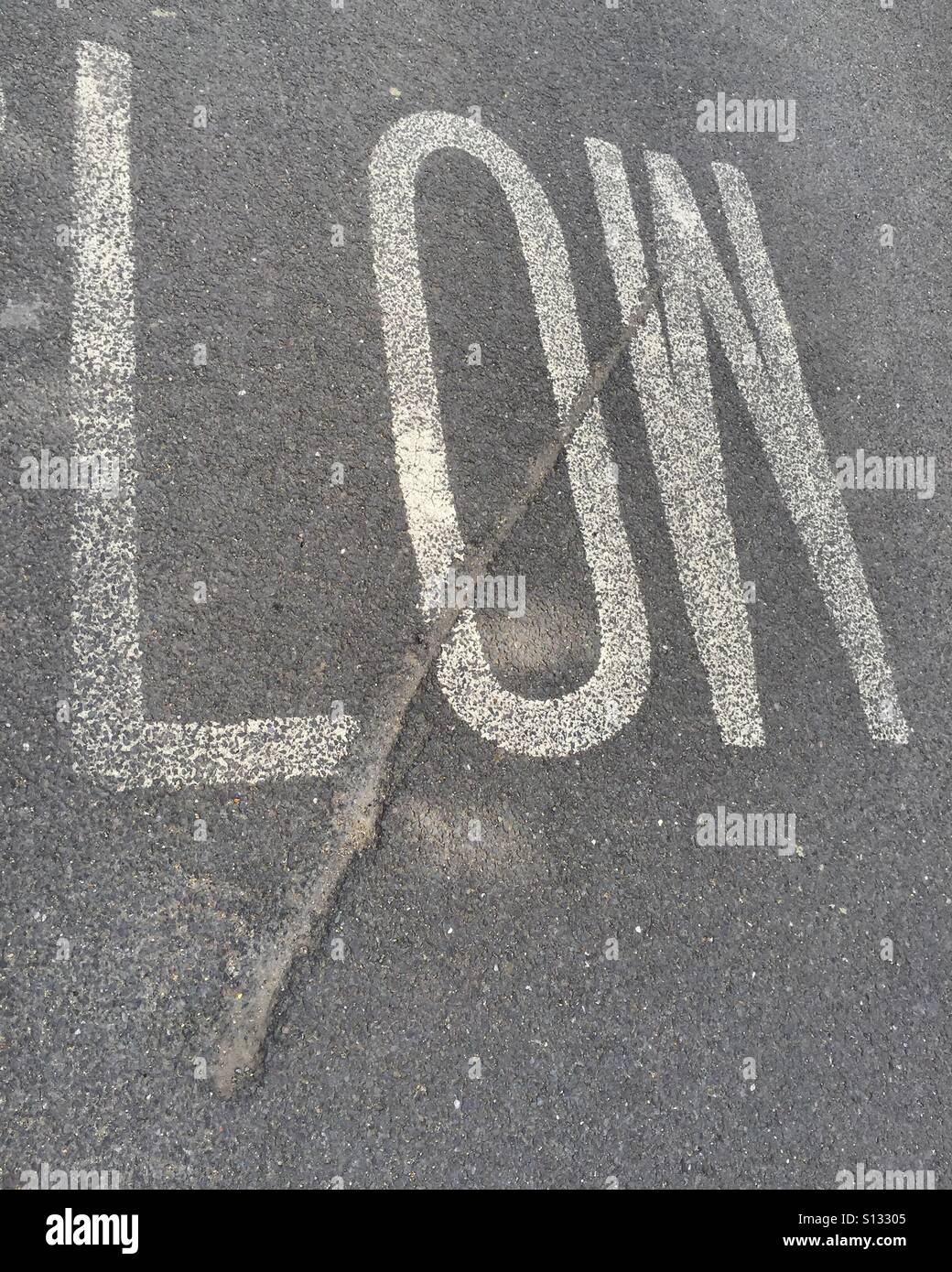 Writing on the road Stock Photo - Alamy