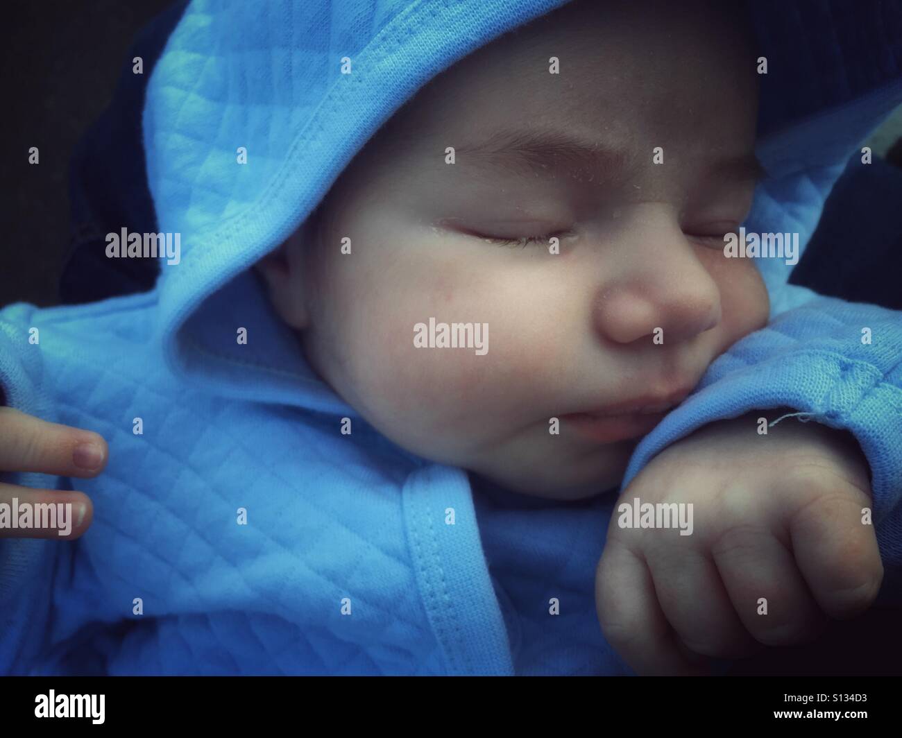 Newborn baby boy sleeping Stock Photo - Alamy