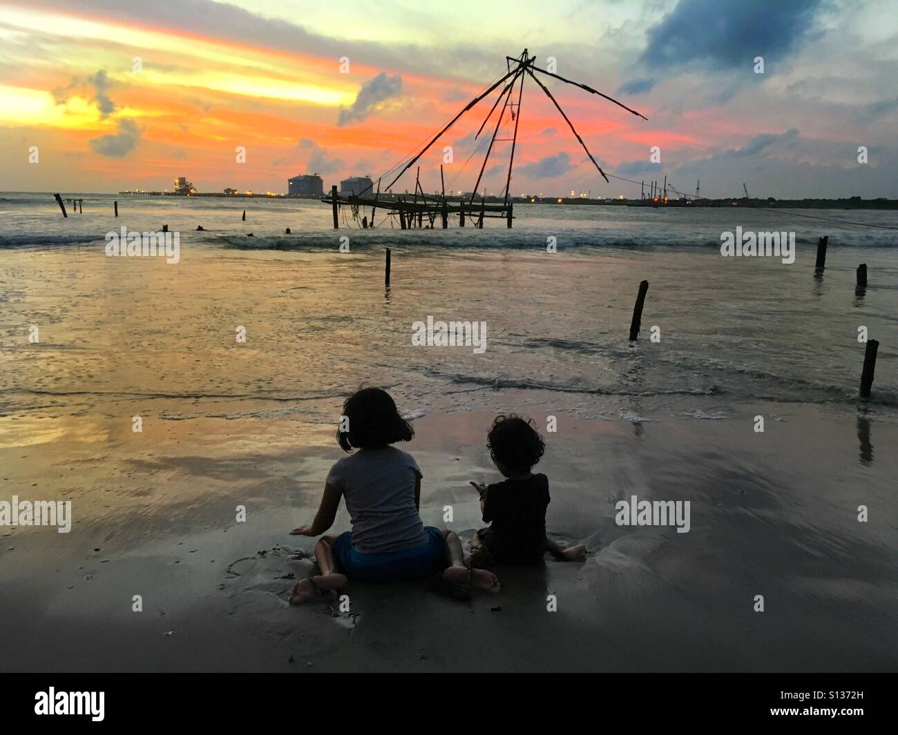 Kids playing on beach hi-res stock photography and images - Alamy