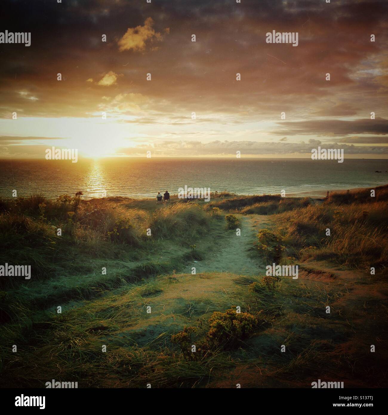 Watching sunset hi-res stock photography and images - Alamy
