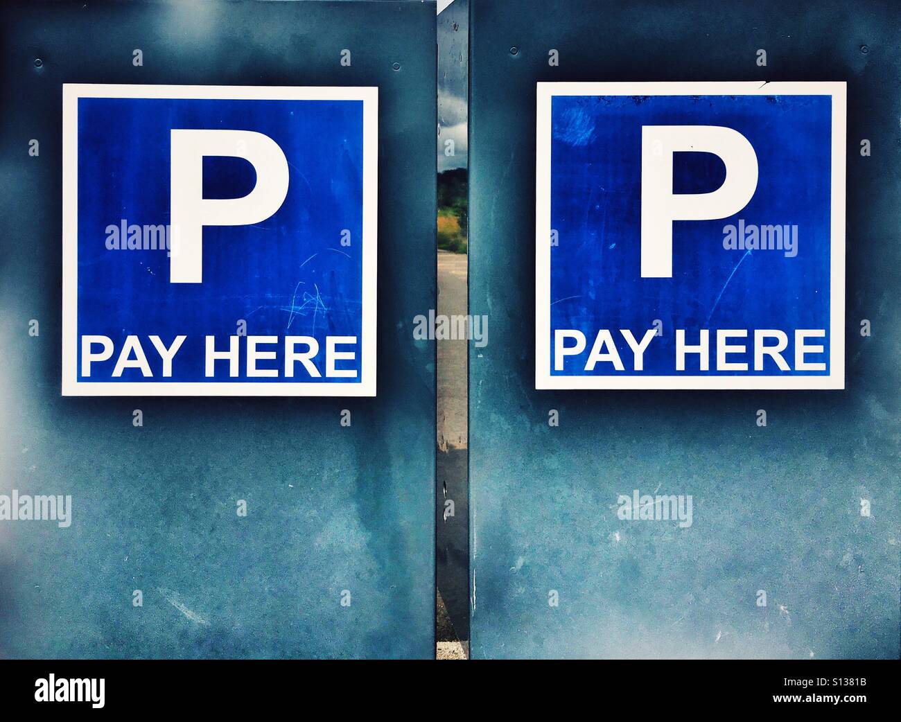Pay here signs for car park Stock Photo - Alamy