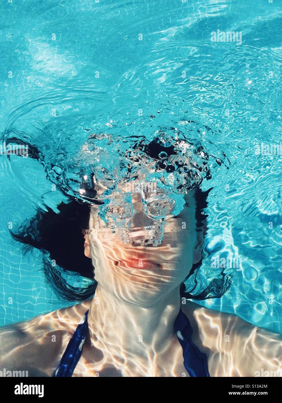 Woman submerged pool hi-res stock photography and images - Alamy