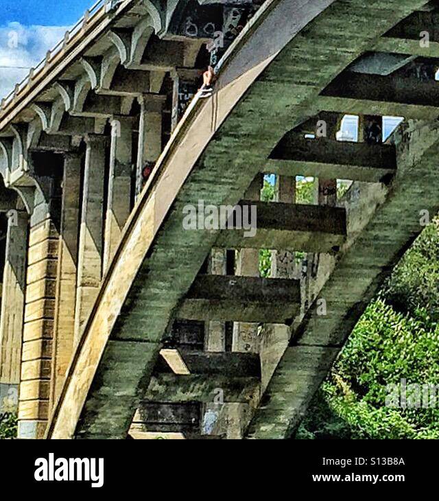 Climbing to the top of the bridge hi-res stock photography and images ...