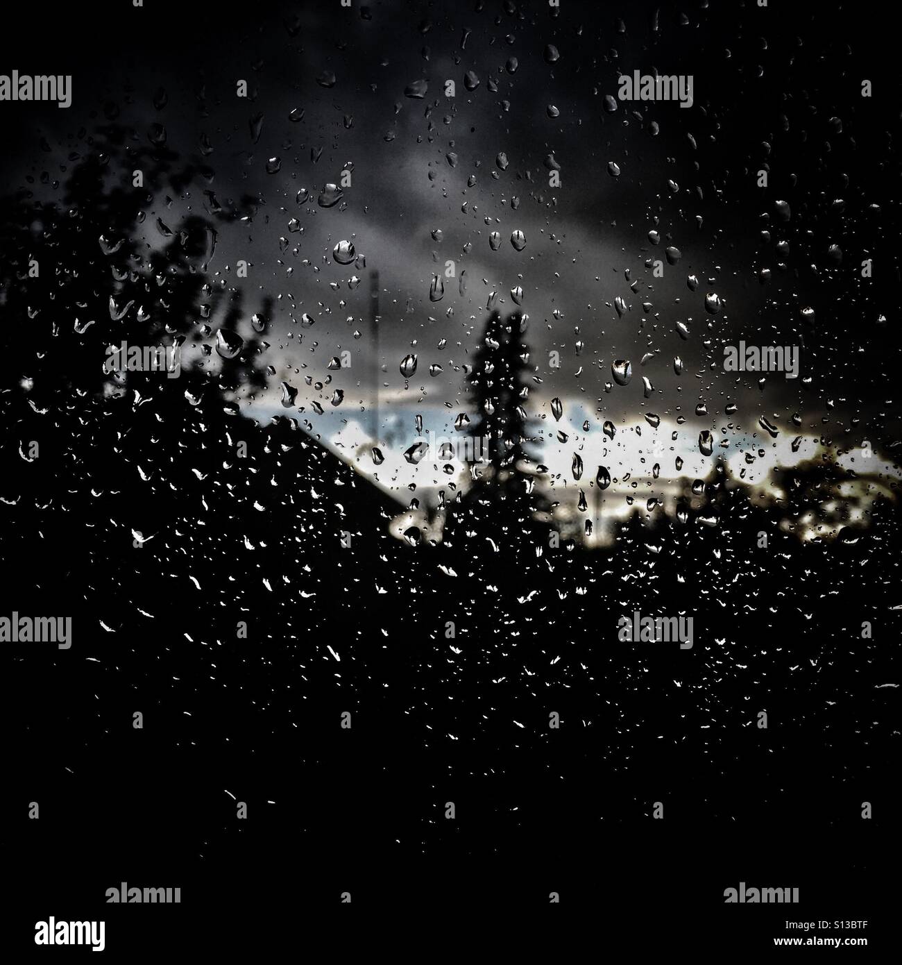 Rain on window Stock Photo - Alamy