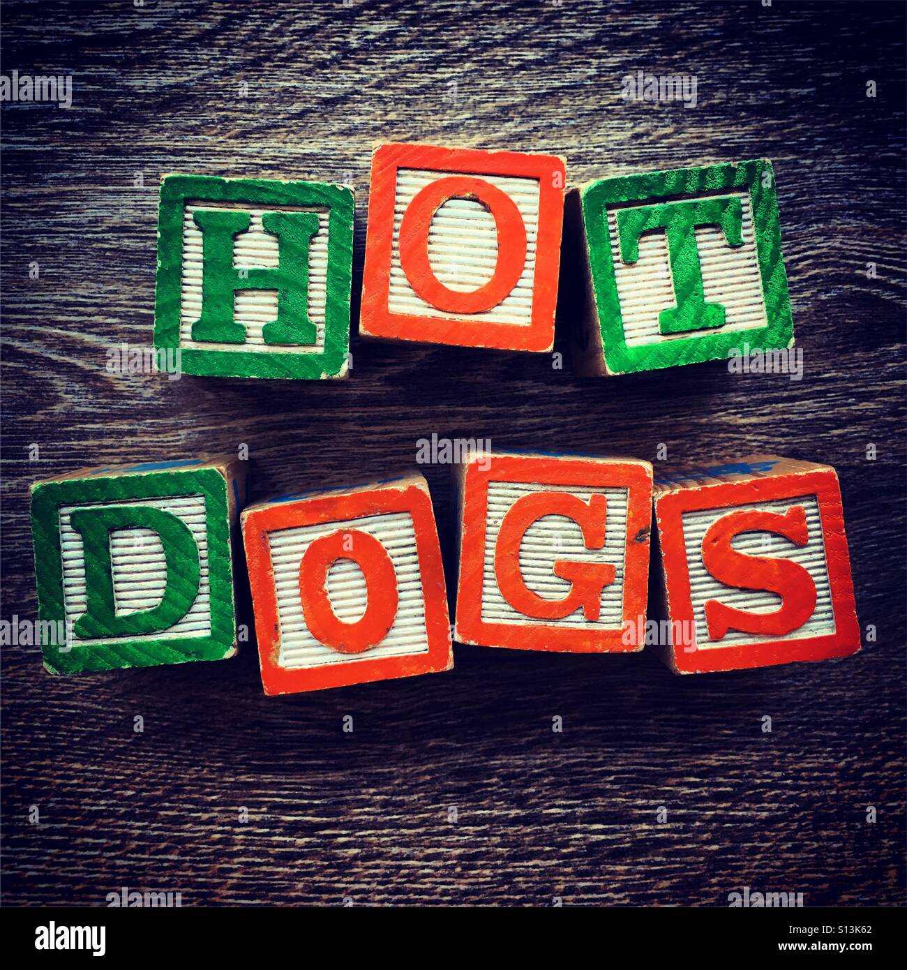 HOT DOGS word written with wood block letter toys Stock Photo - Alamy
