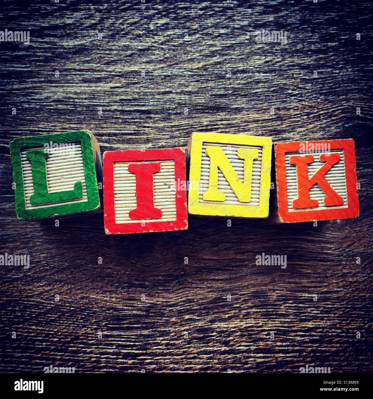 LINK word written with wood block letter toys Stock Photo - Alamy