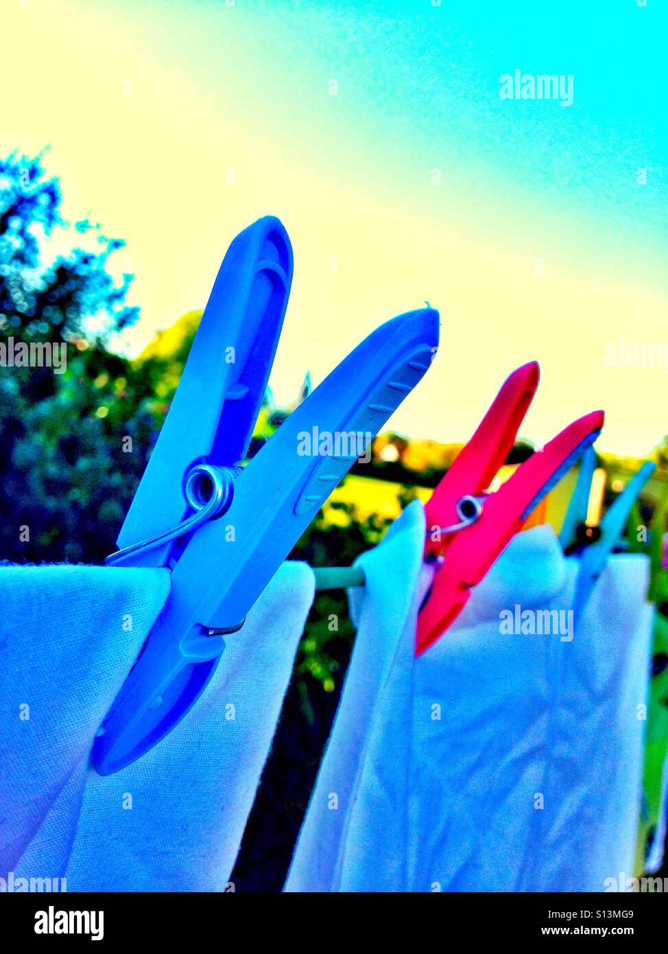 Sheets drying on a washing line Stock Photo - Alamy