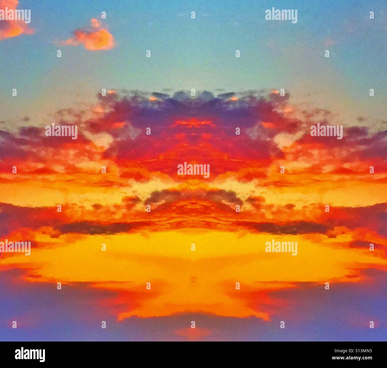 Spectacular sunset showing an angry face formation Stock Photo - Alamy