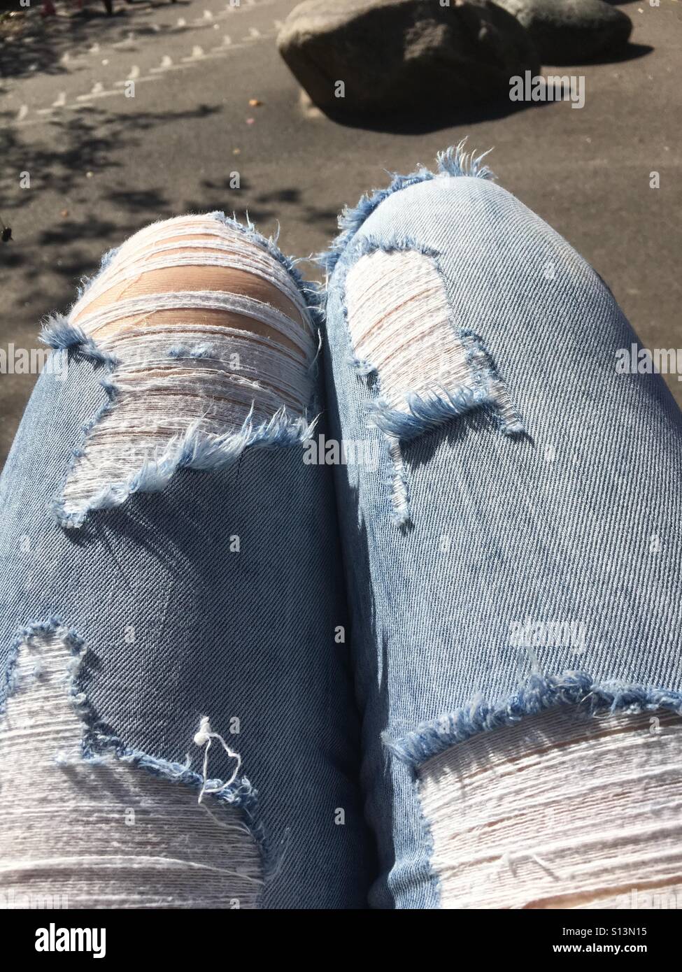 Ripped jeans hi-res stock photography and images - Alamy