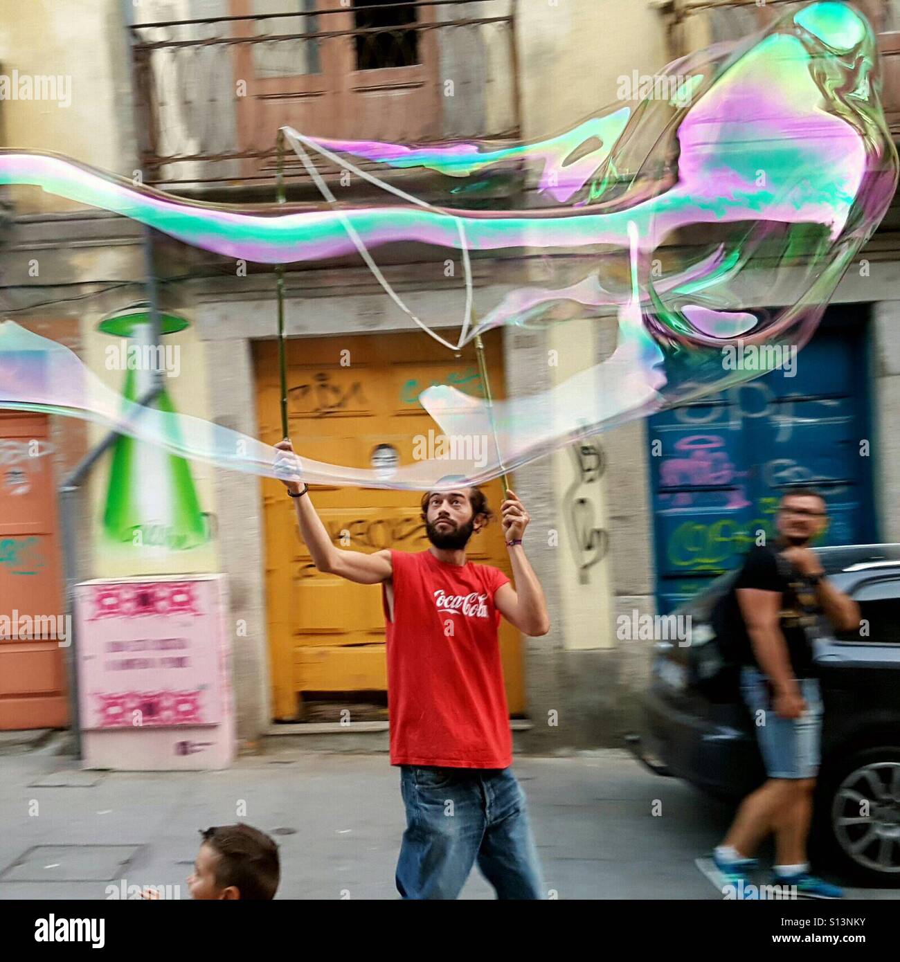 Giant bubble bubbles street performer hi-res stock photography and ...