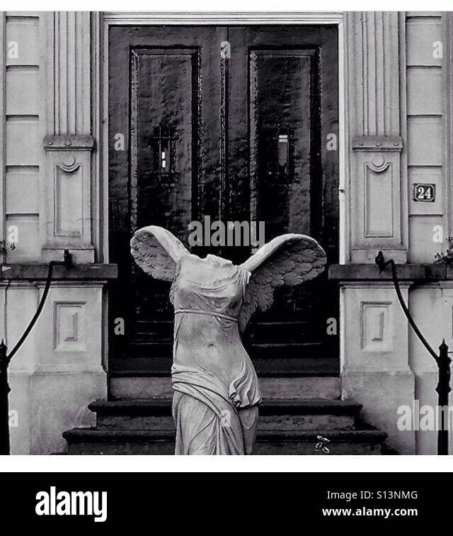 Angel at the front door Stock Photo - Alamy