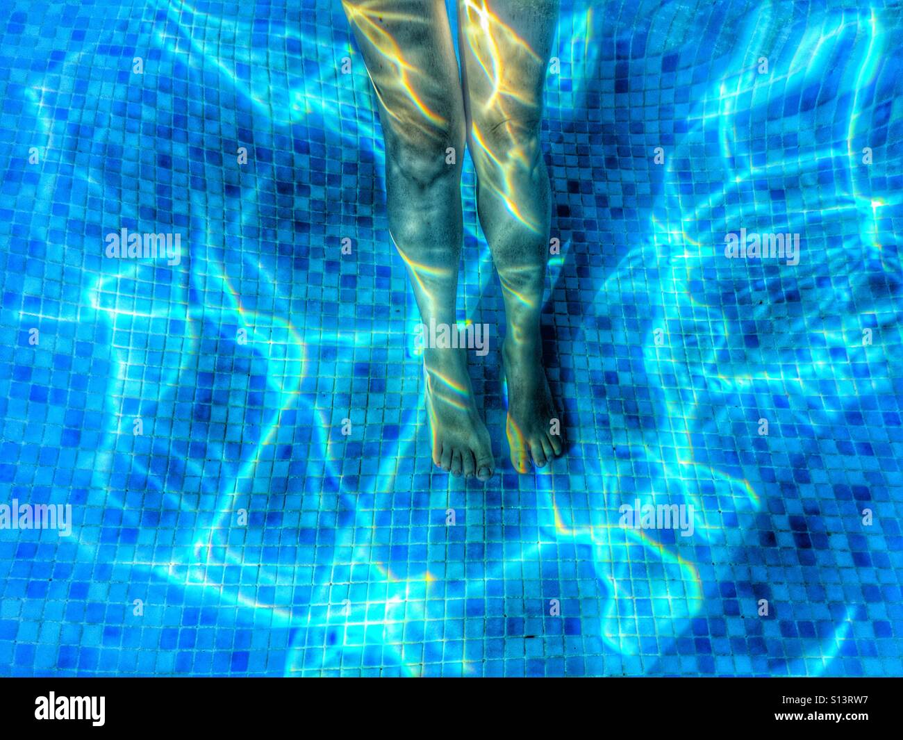 Standing in swimming pool under water hi-res stock photography and ...