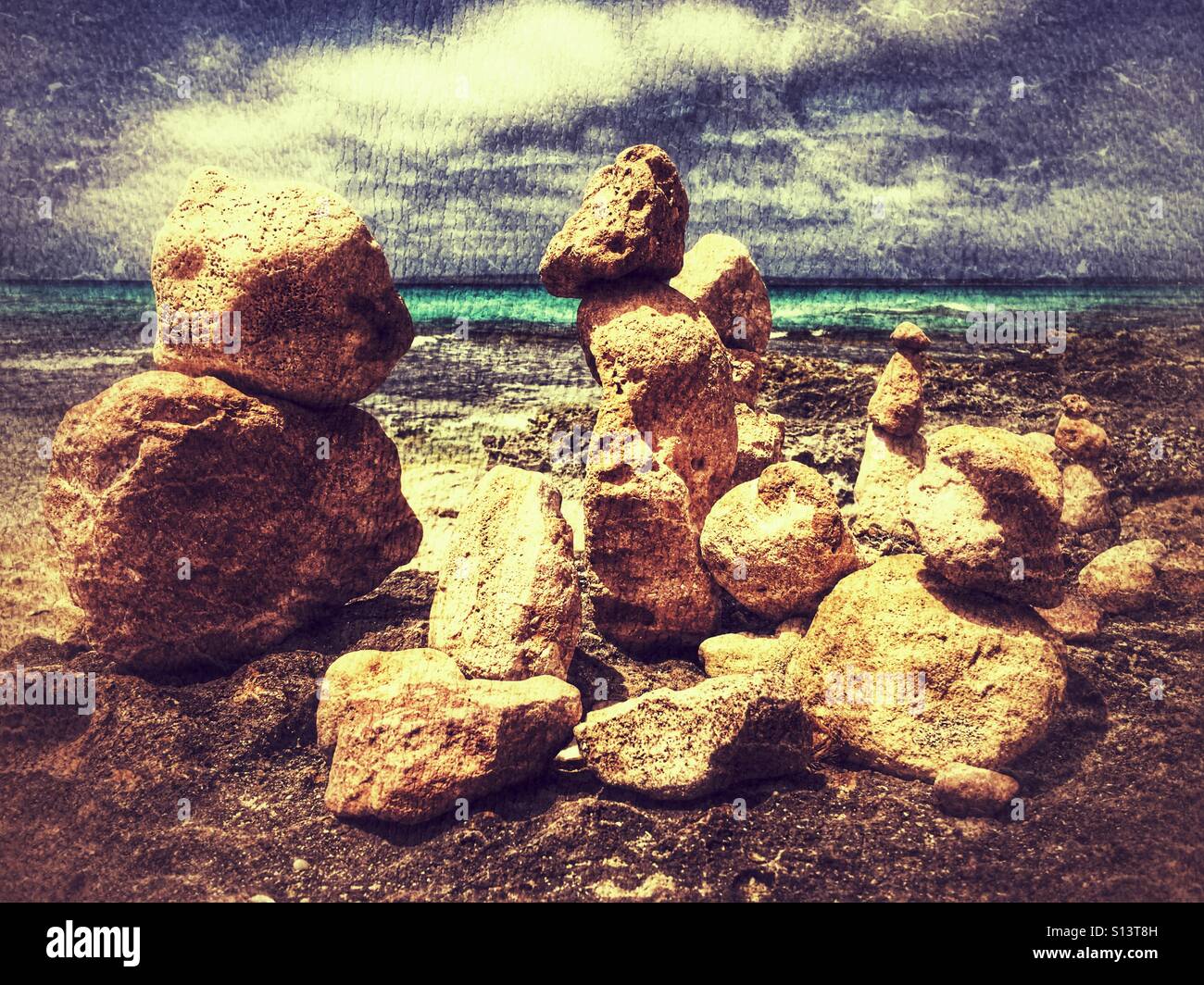 Stack of small rocks on a beach Stock Photo - Alamy