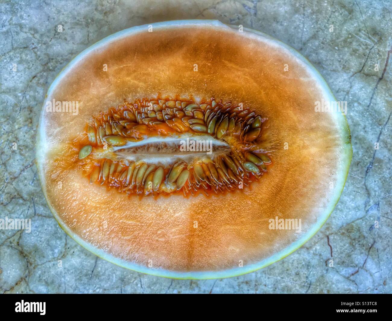 Sugar Baby Gold, melon Stock Photo - Alamy