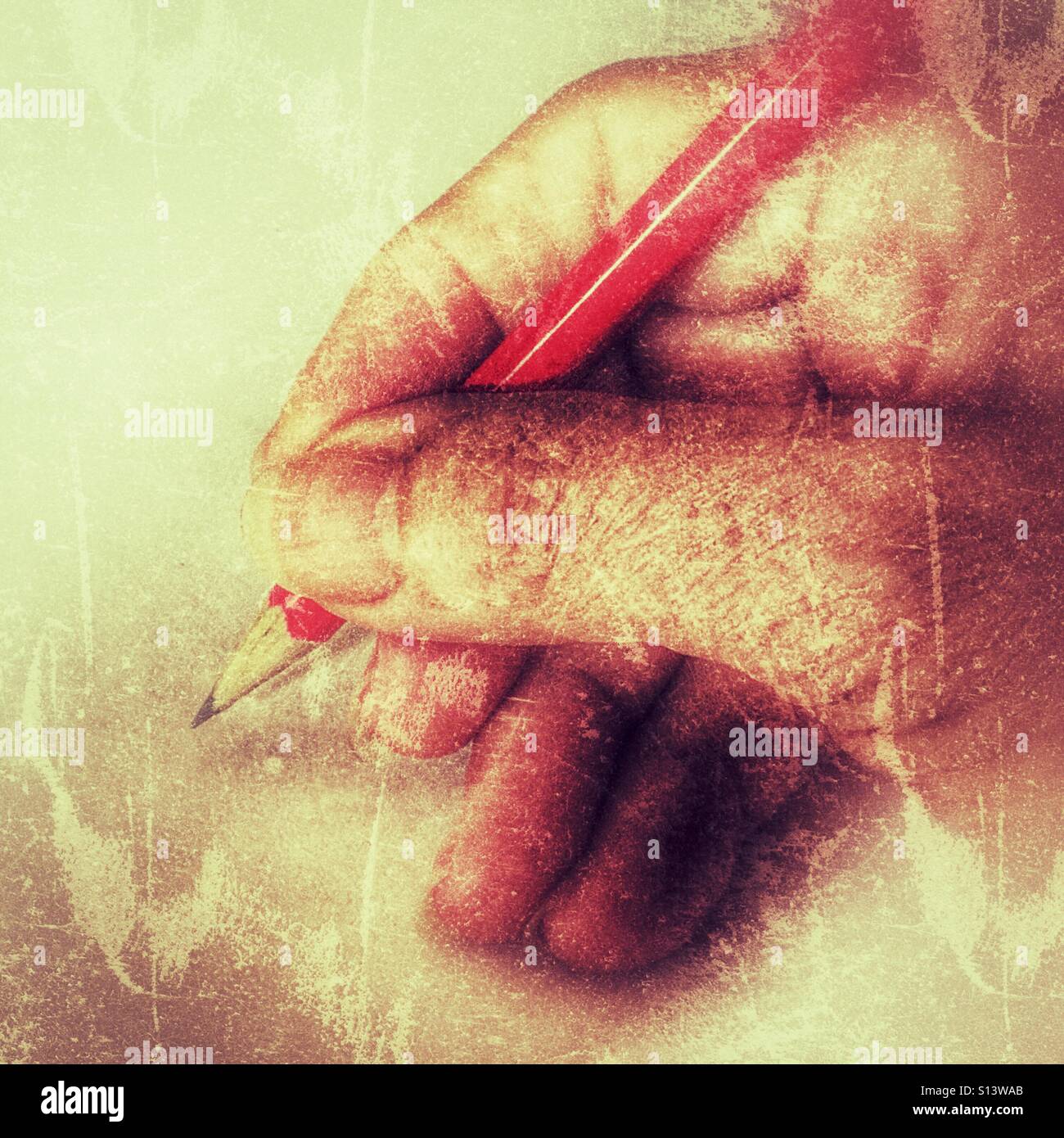 Hand holding pencil hi-res stock photography and images - Alamy