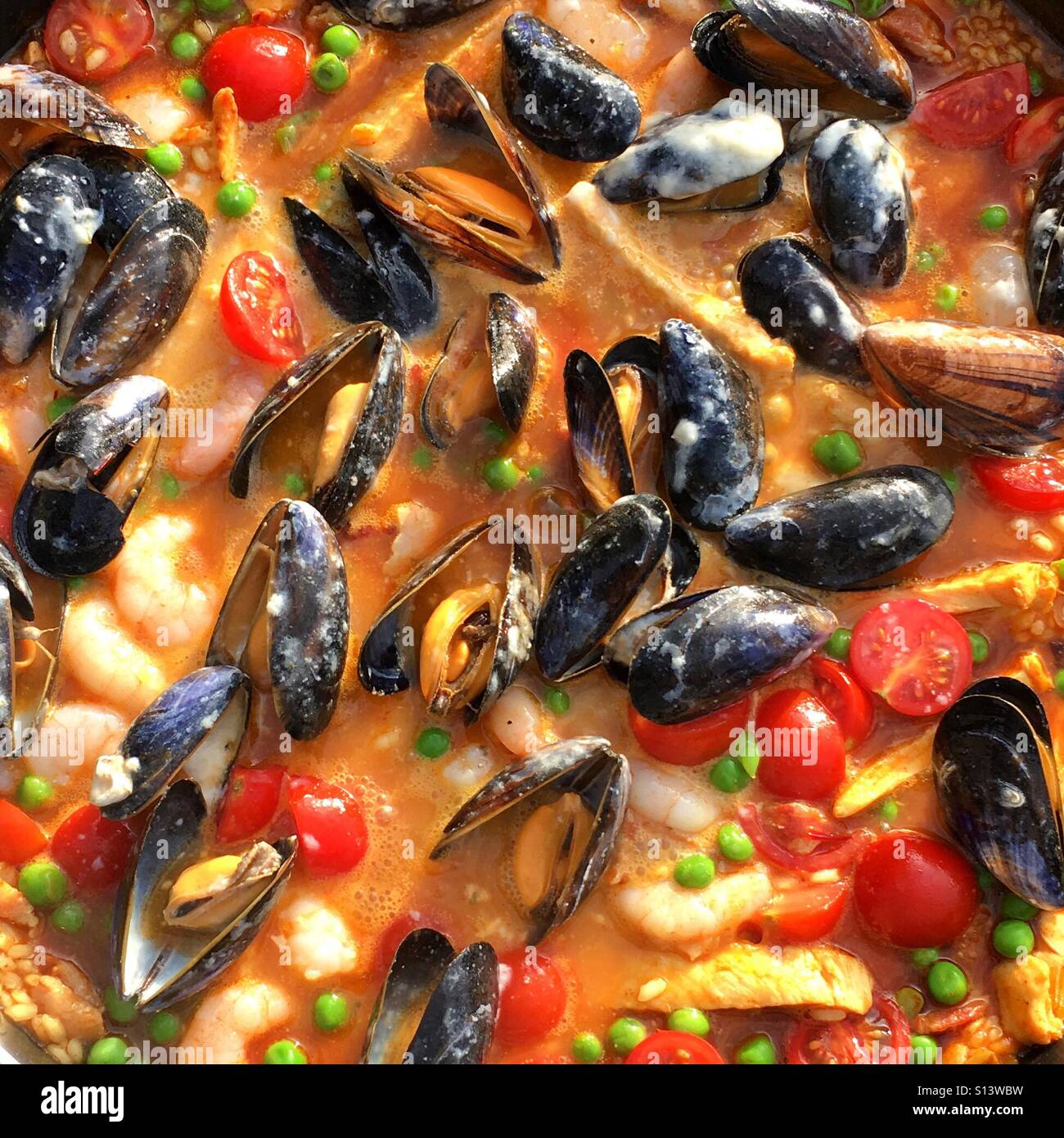 Paella ingredients cooking Stock Photo - Alamy