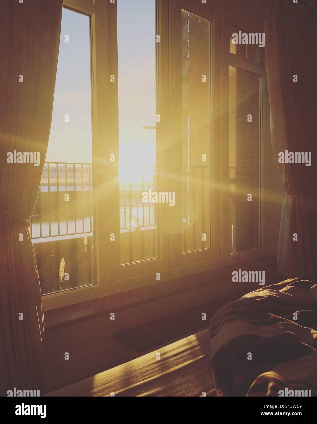 Waking up to sunrise Stock Photo - Alamy