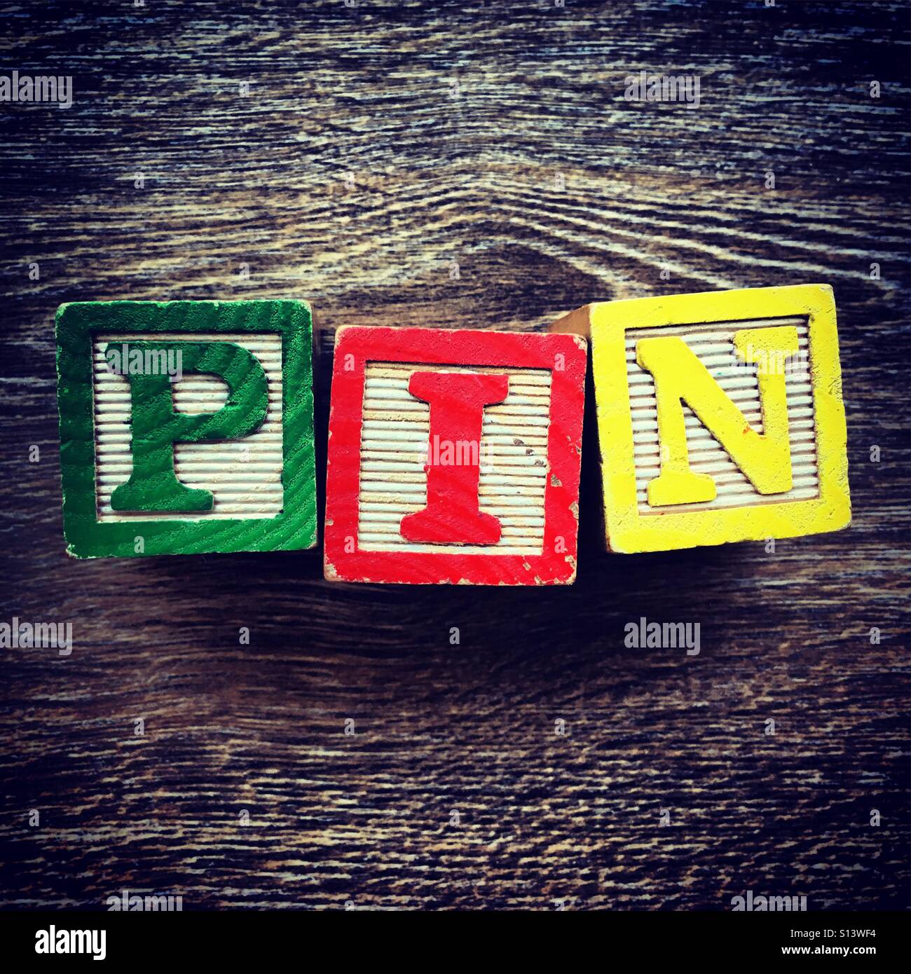 PIN word written with wood block letter toys Stock Photo - Alamy