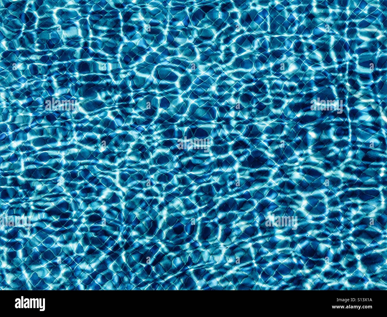 Light refraction in swimming pool water Stock Photo - Alamy