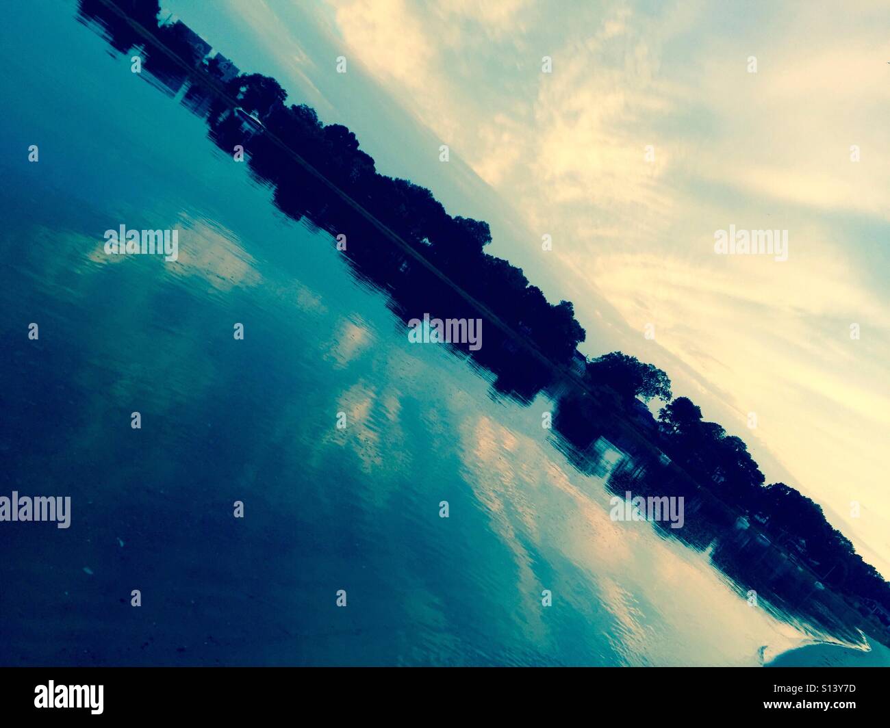 Sky reflection on the ocean Stock Photo - Alamy