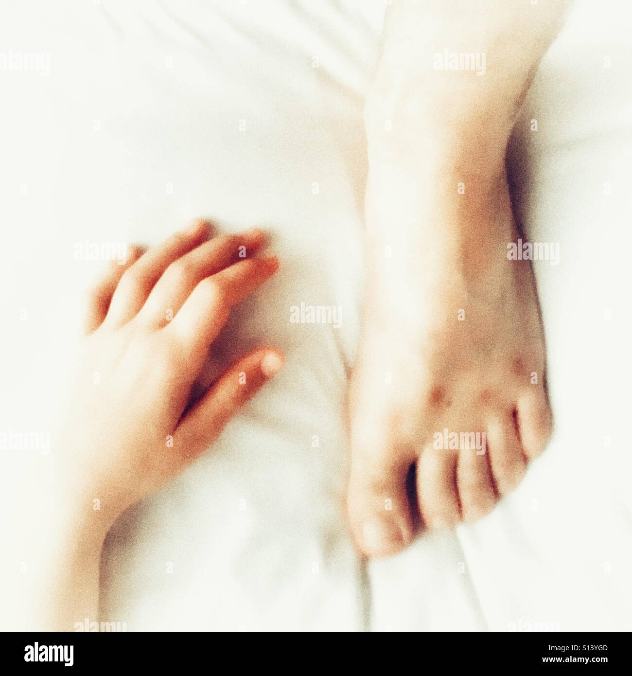 Hand and foot Stock Photo - Alamy