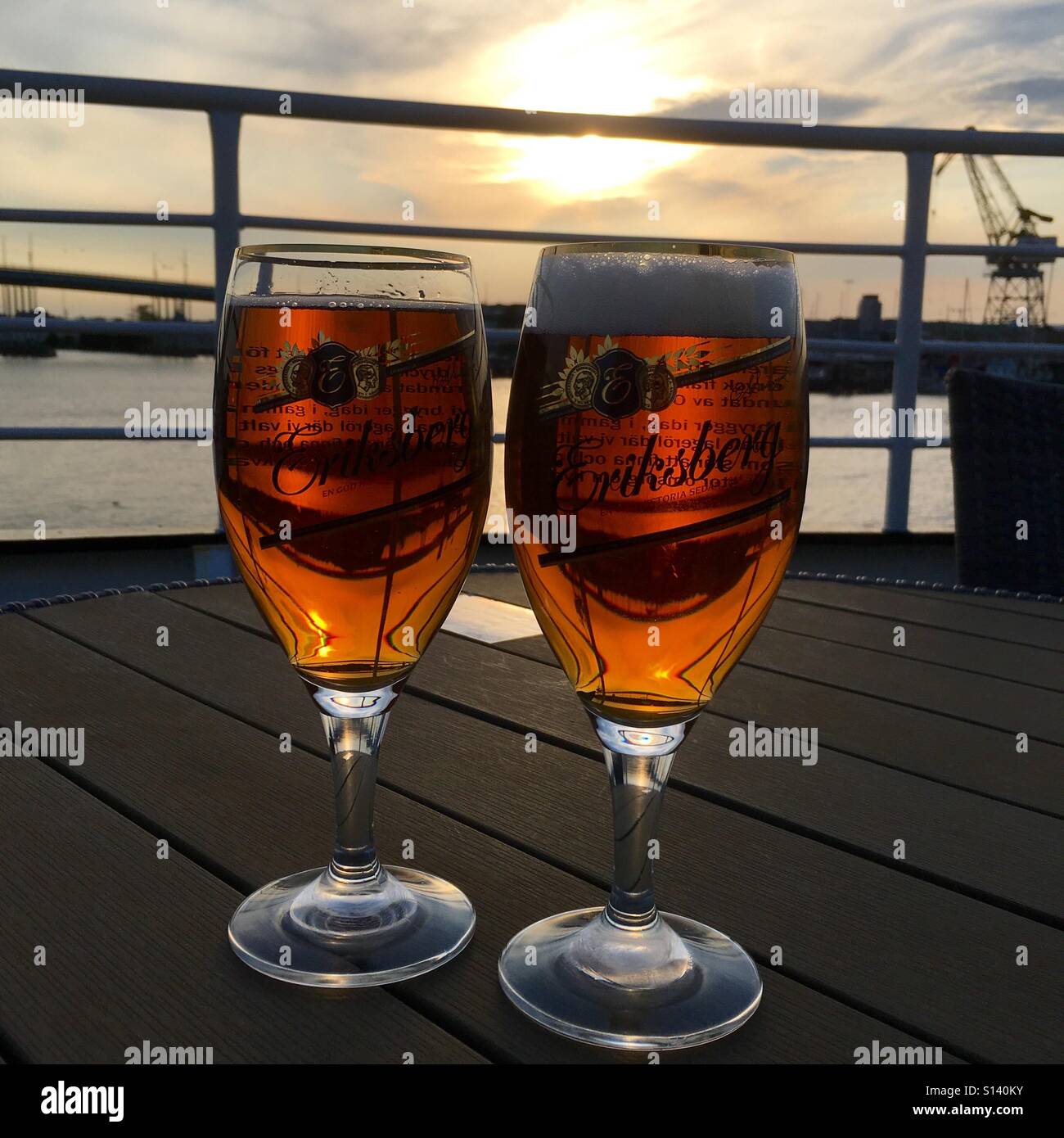 2 pints of bear at sundown Stock Photo - Alamy