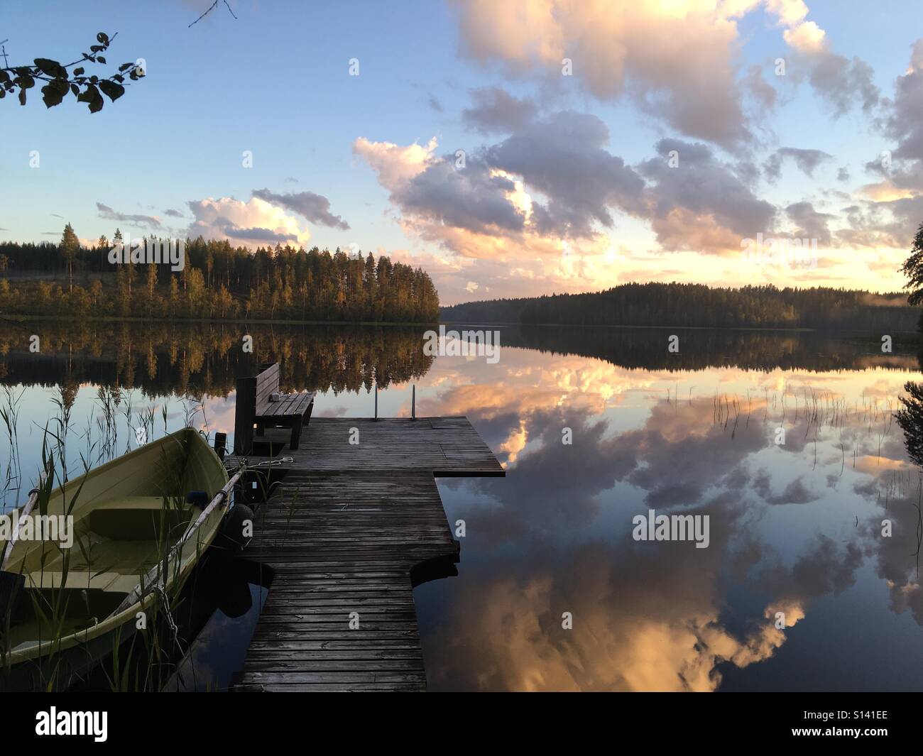 Sunset by the lake Stock Photo - Alamy