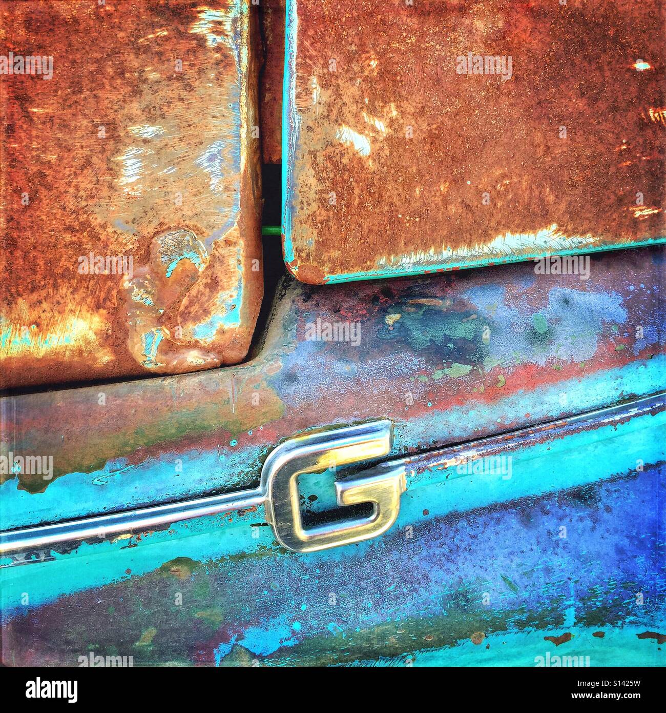 Detail of rusted vintage Dodge truck with the "G" from Dodge Stock ...