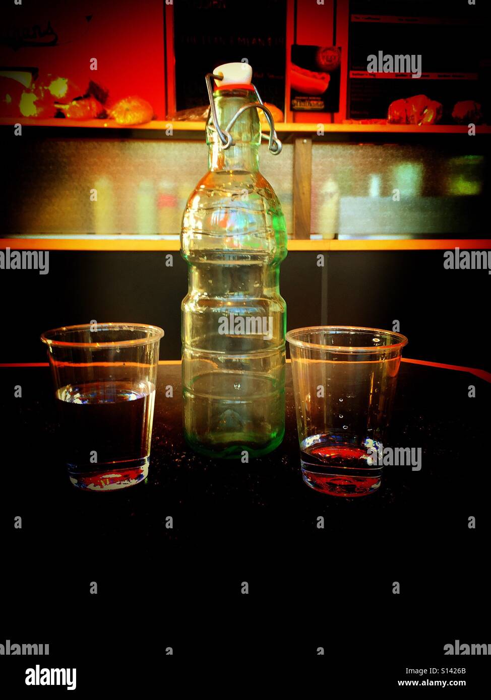Bottle of water and two cups Stock Photo - Alamy