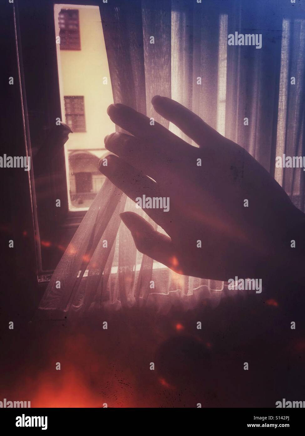 Hand opening window curtain Stock Photo - Alamy