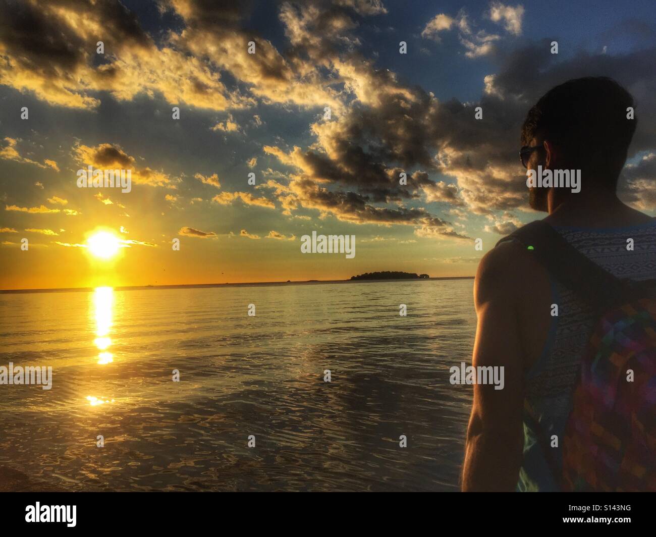 Beautiful man Beautiful sun Stock Photo - Alamy