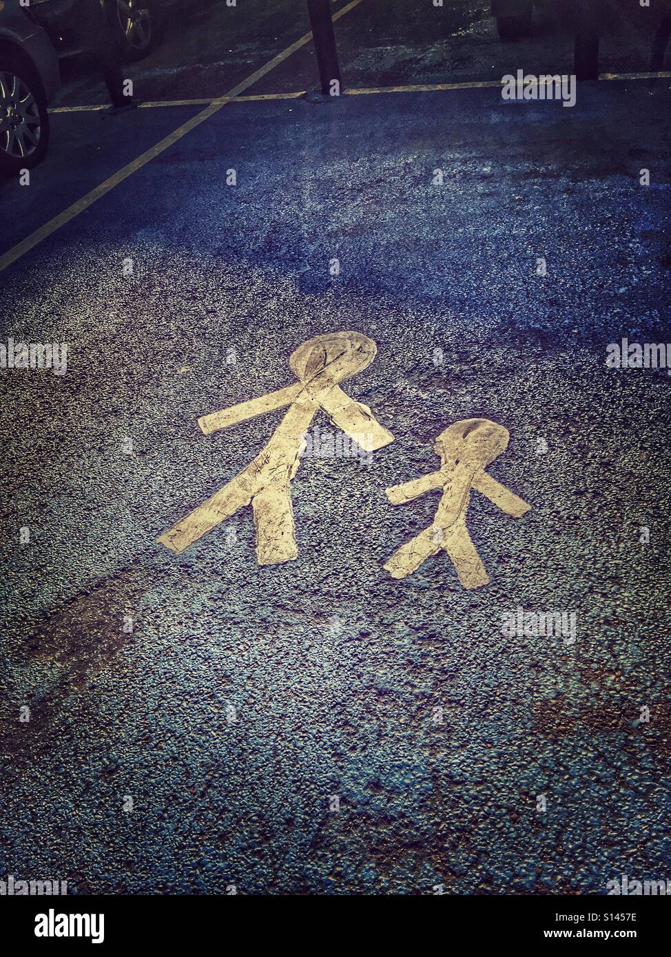 Patent and child parking sign Stock Photo - Alamy