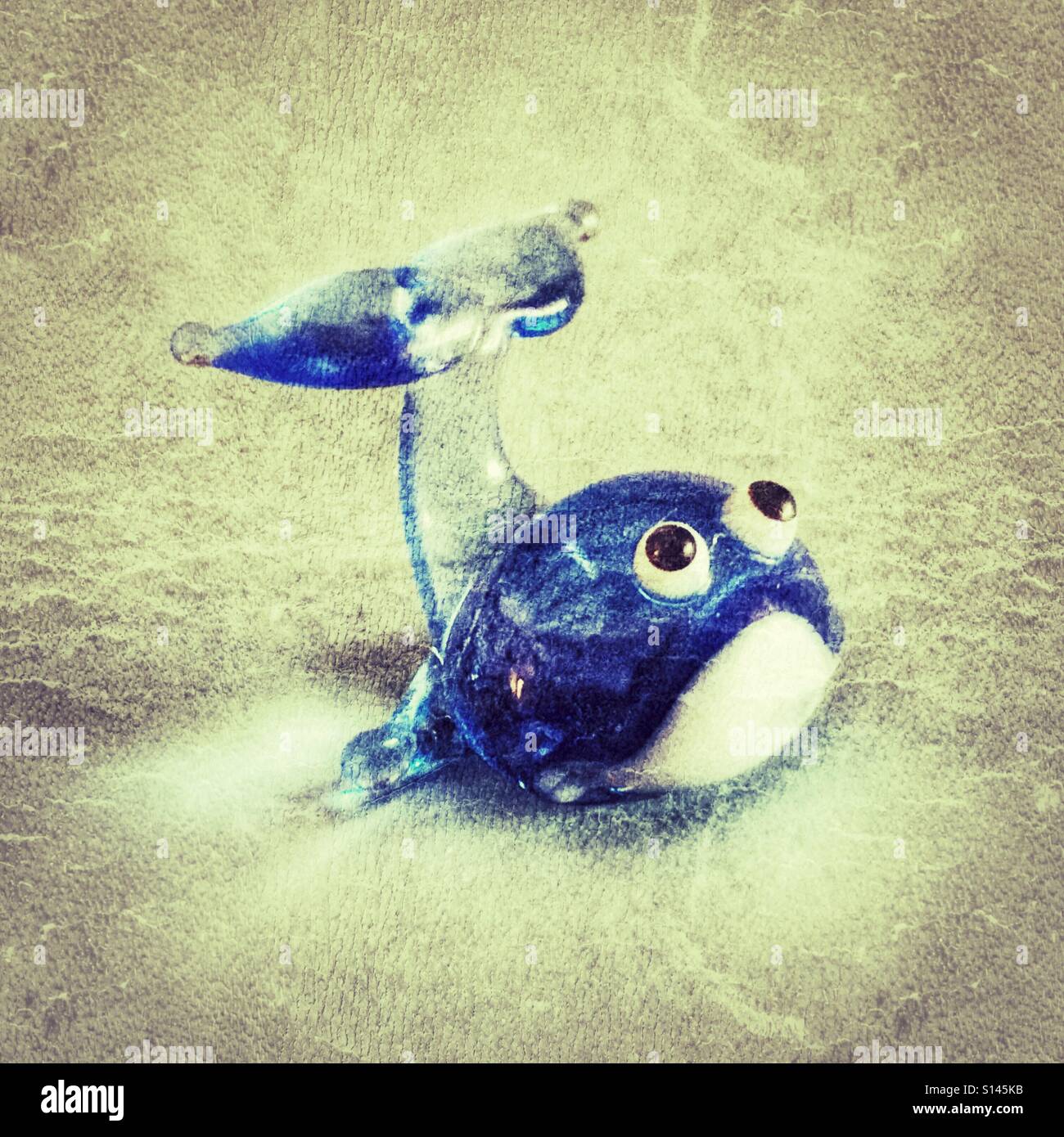 Miniature glass whale Stock Photo - Alamy