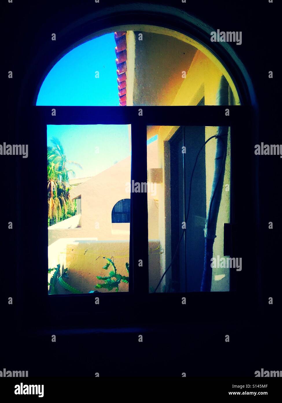 View out of Mexican window Stock Photo - Alamy
