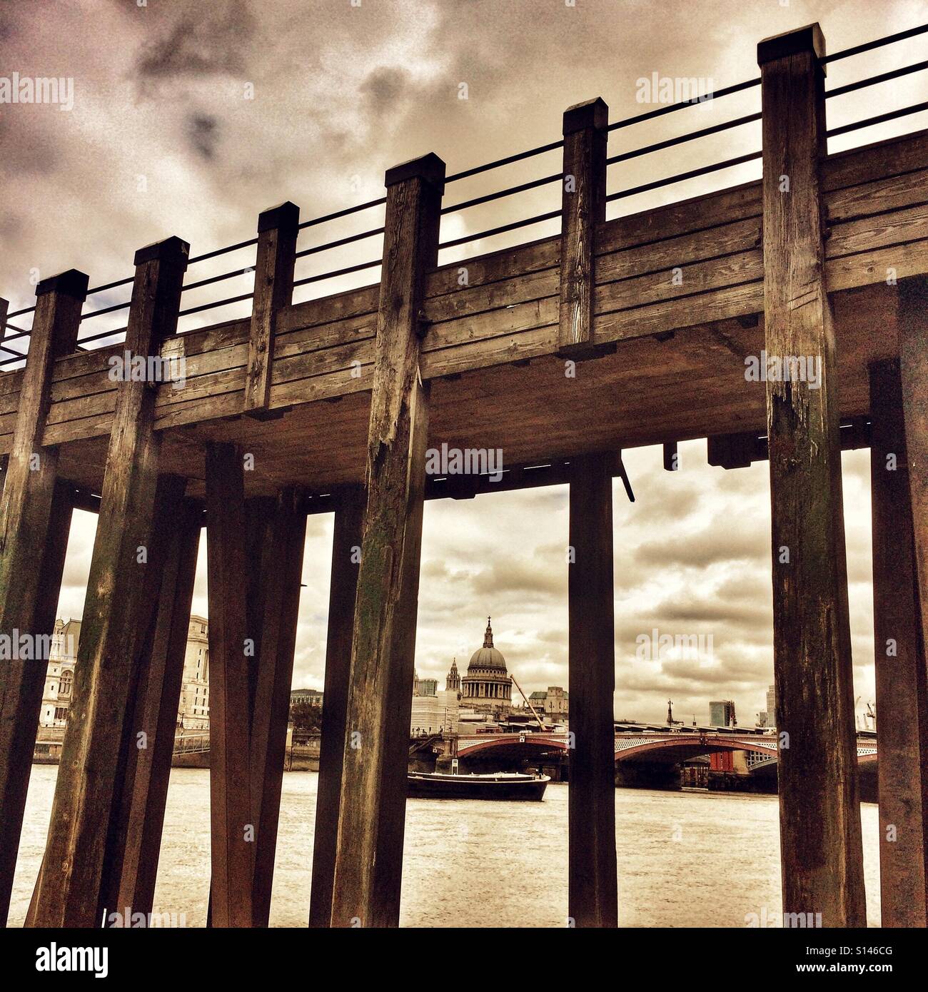 River Thames Pier with St Pauls Cathedral in the distance London UK ...