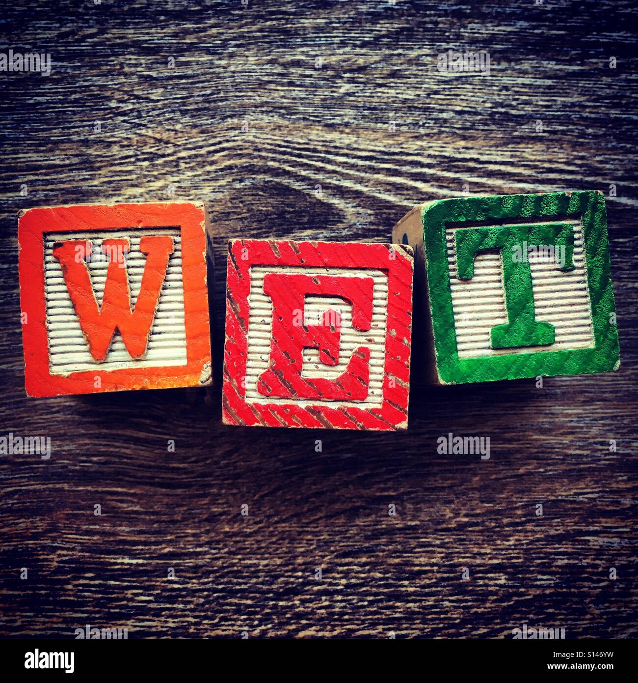 WET word written with wood block characters Stock Photo - Alamy